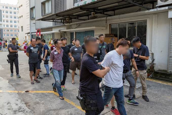 Singapore: Police arrest 66 people involved in gang-related crimes in ...